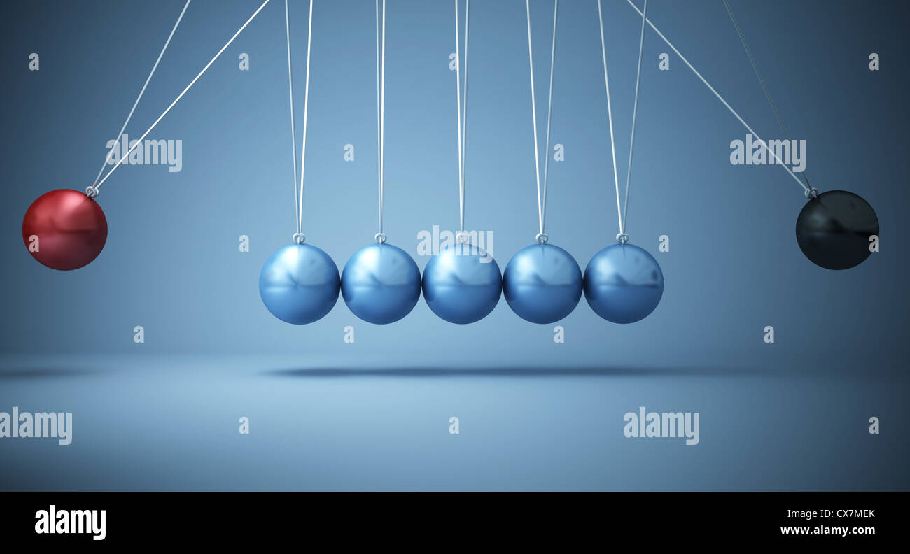 classic newton cradle with opposite power Stock Photo - Alamy