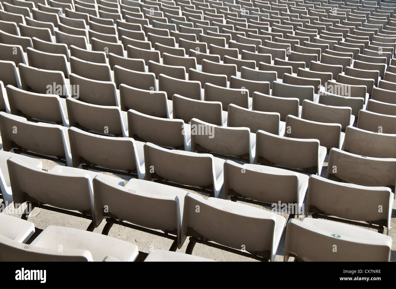 Rows of empty seats in sport stadium Stock Photo - Alamy
