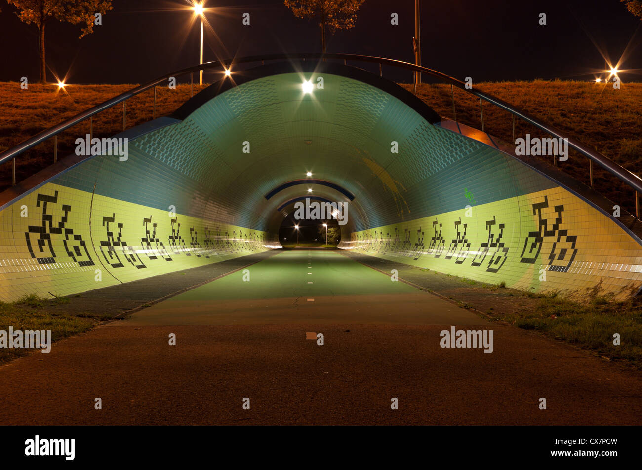 night shot of a tunnel for bicycles and pedestrians Stock Photo - Alamy