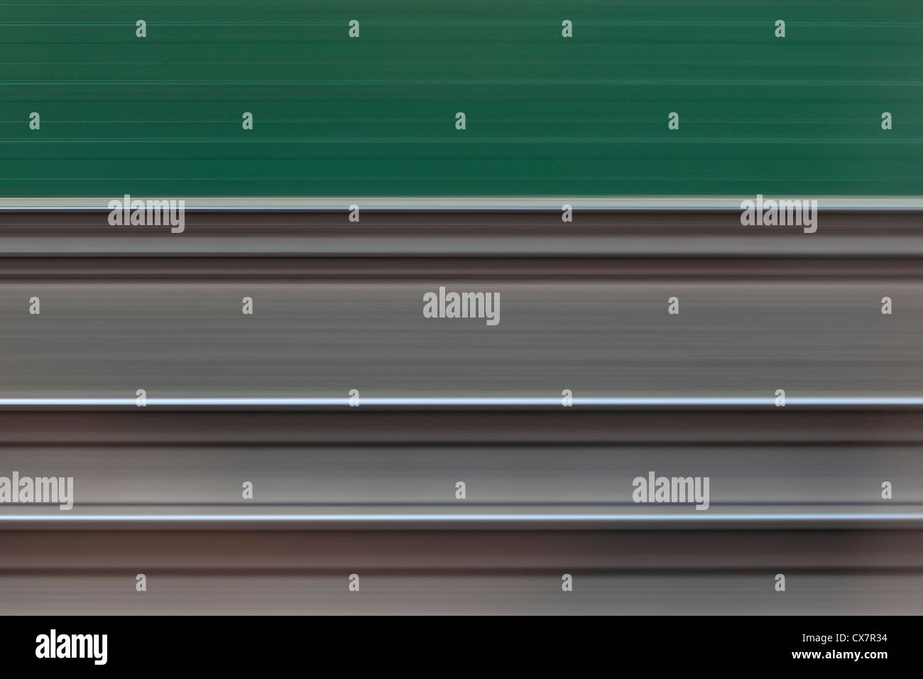 Railroad tracks viewed in abstract blurred motion from moving train ...