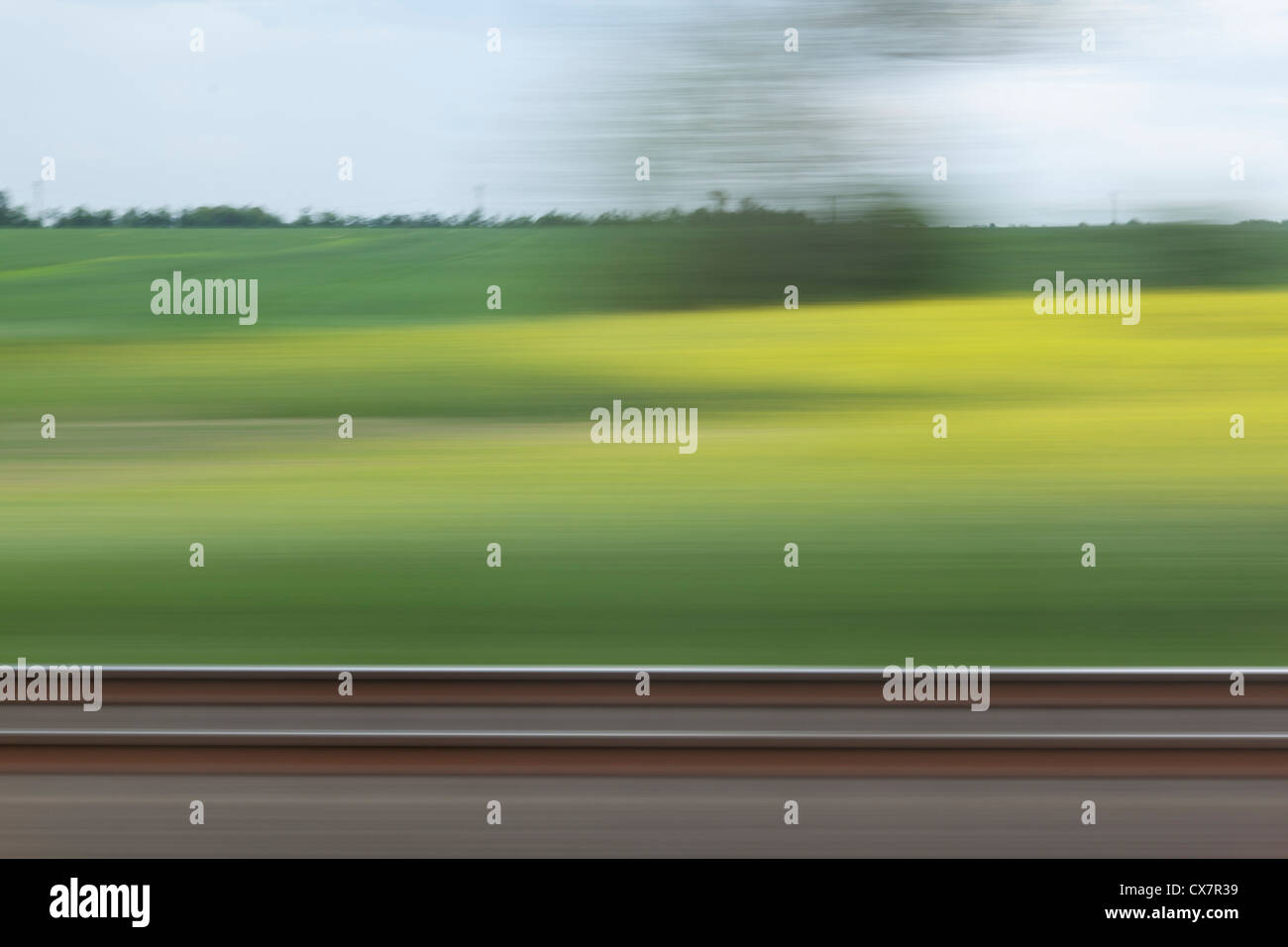 A rural landscape in blurred motion viewed from a moving train Stock ...
