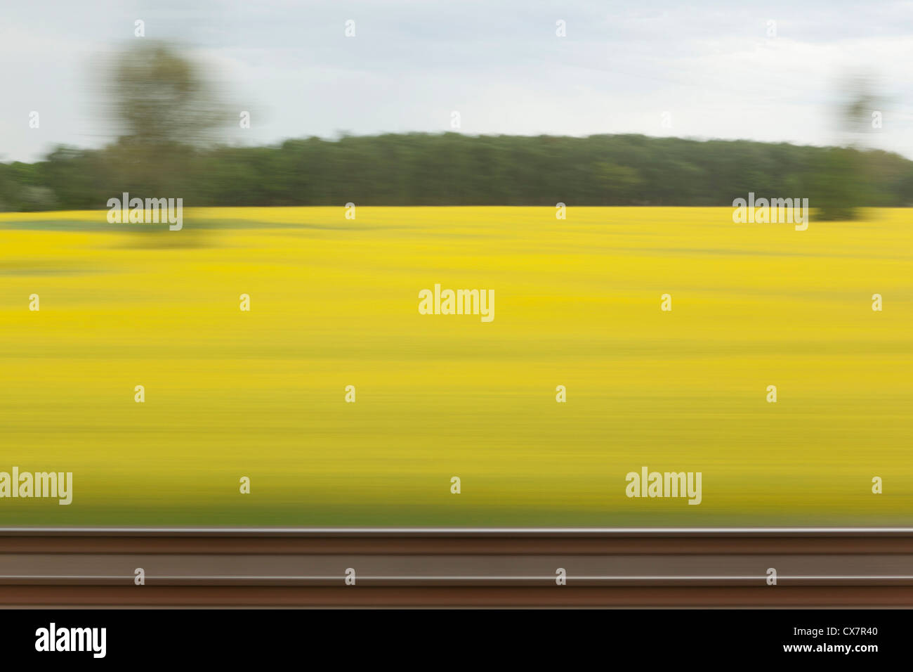 A rural landscape in blurred motion viewed from a moving train Stock ...