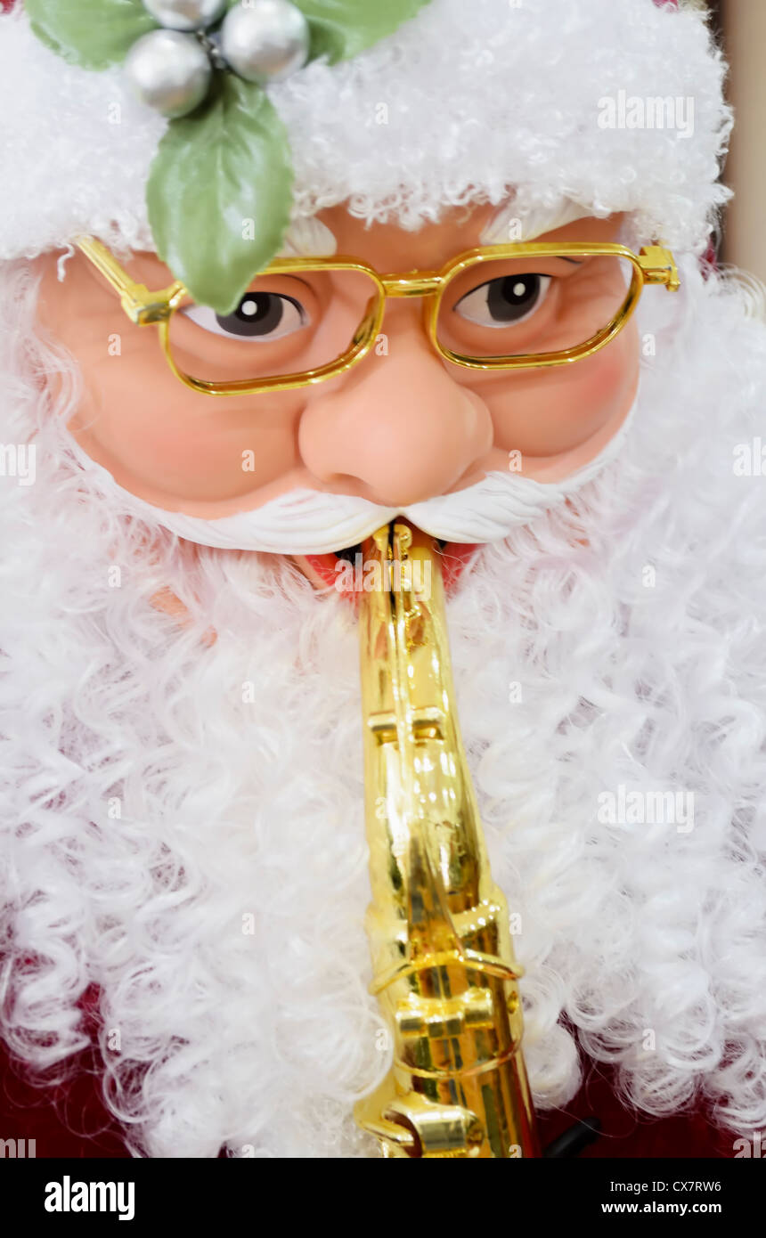 Santa playing saxophone hi-res stock photography and images - Alamy