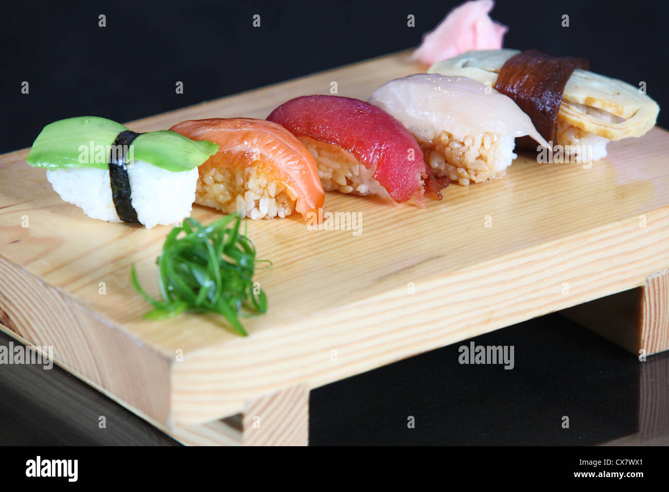 An assortment of various types of sushi including: Sushi Maki, futo ...