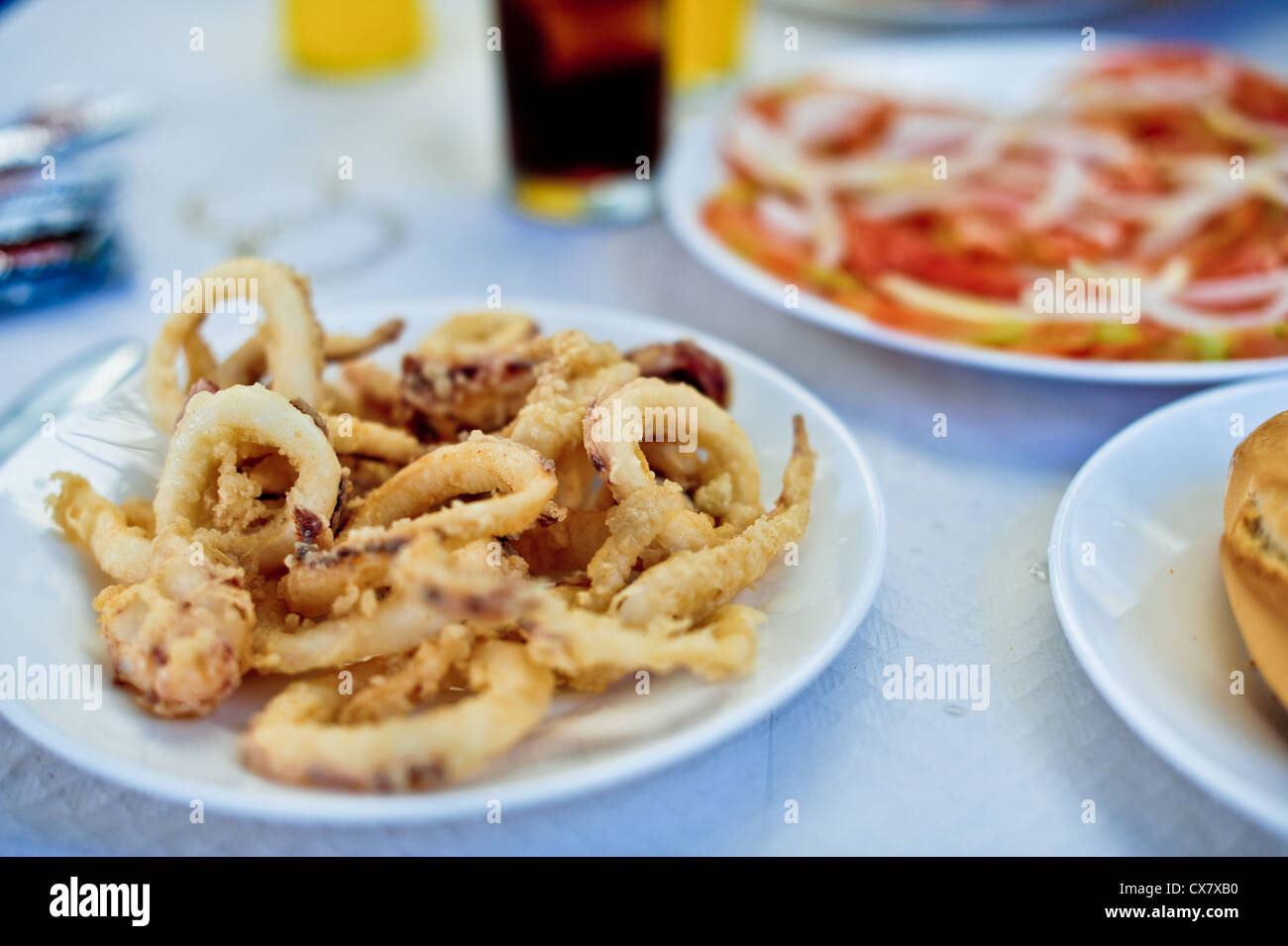 A plate of Calamari in a Spanish restaurant Stock Photo - Alamy