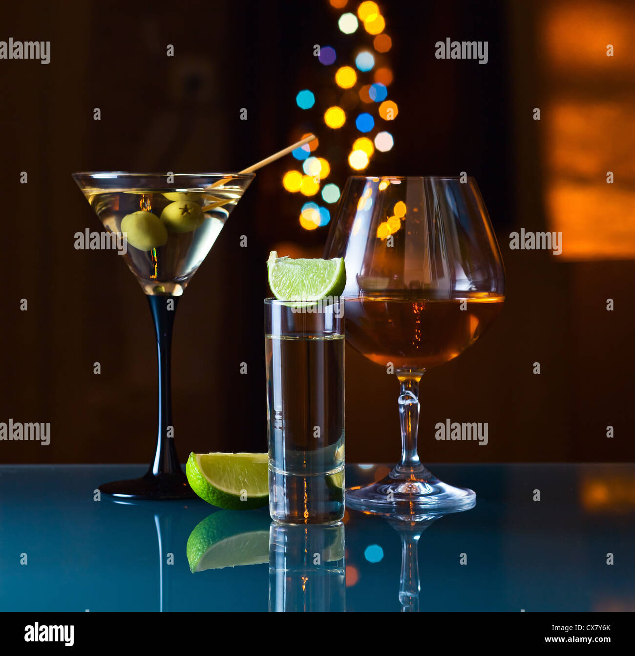Alcoholic drinks in a bar on a glass table Stock Photo - Alamy