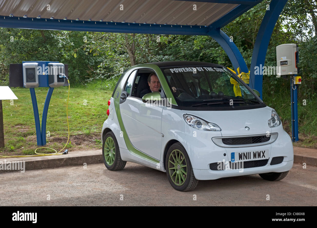 Electric Smart car at charging station UK Stock Photo - Alamy