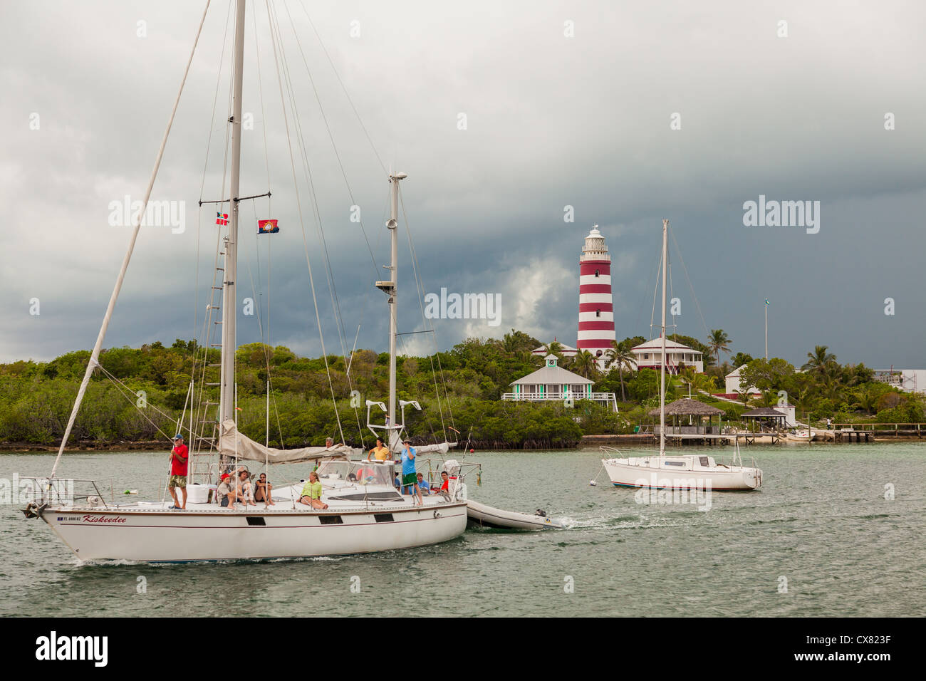 Hope Town lighthouse and harbor Elbow Cay Abacos, Bahamas Stock Photo ...