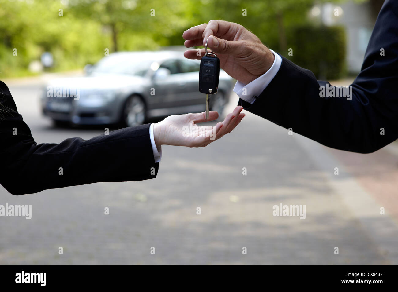 Hand-Over of Keys Stock Photo - Alamy