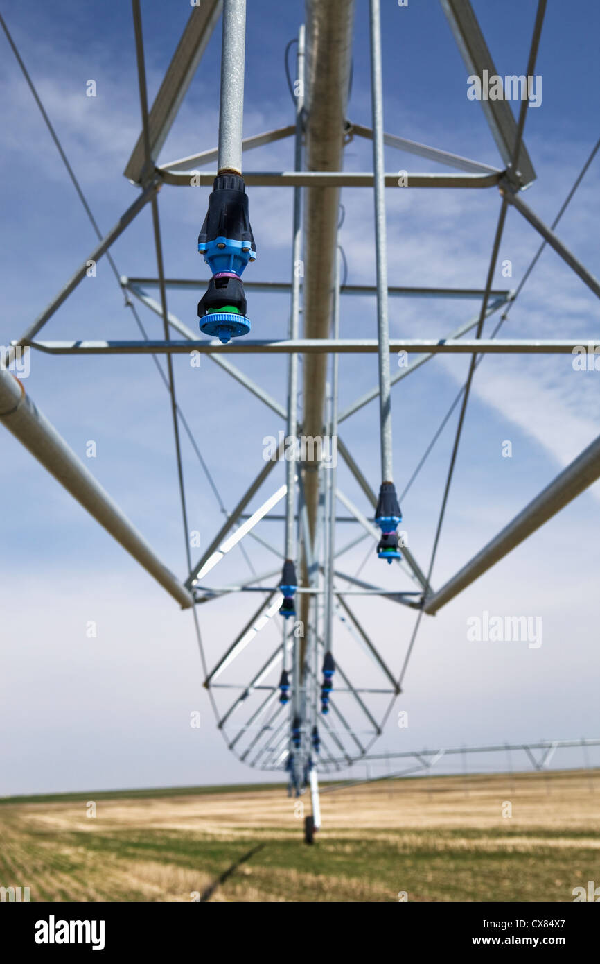 Close Up Of An Irrigation System In Field With Blue Sky And Clouds ...