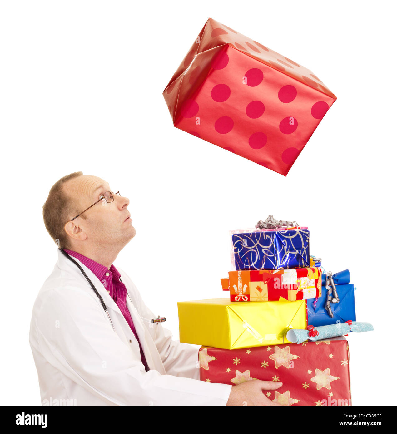 A doctor catching a very big gift Stock Photo - Alamy