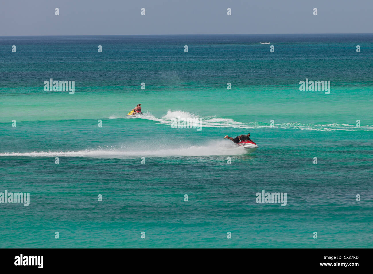 People ride jet skis in Nassau, Bahamas Stock Photo - Alamy
