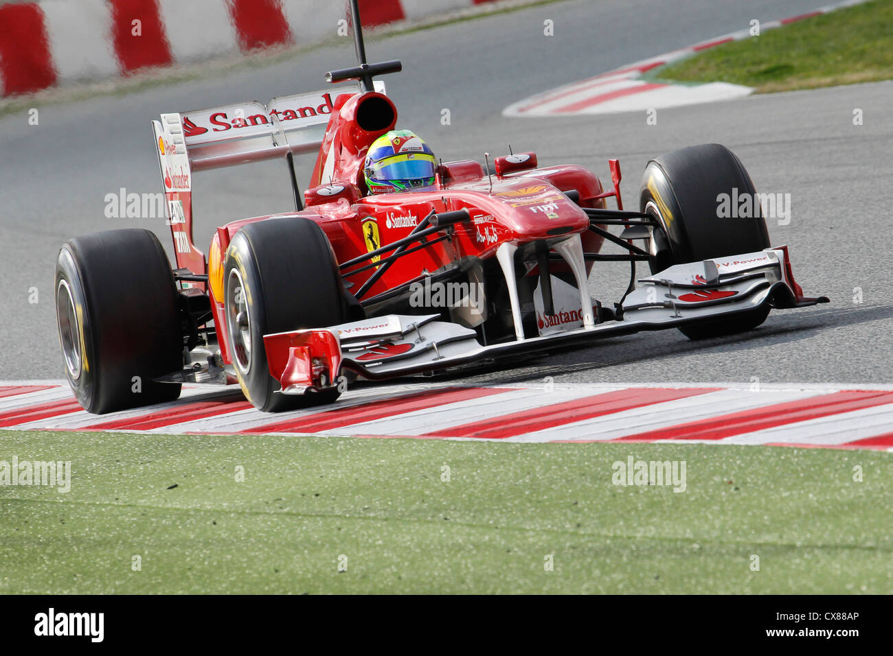 Felippe Massa driving for Ferrari in 2011 at Montmelo racing track in ...