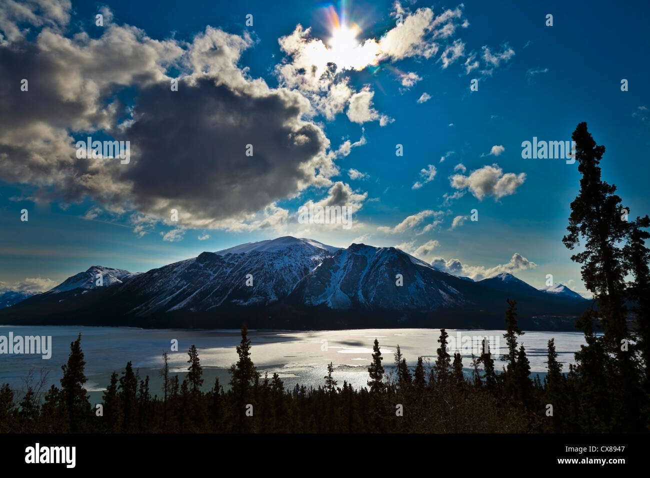 Frozen Tagish Lake And Mountains; Carcross, Yukon, Canada Stock Photo ...
