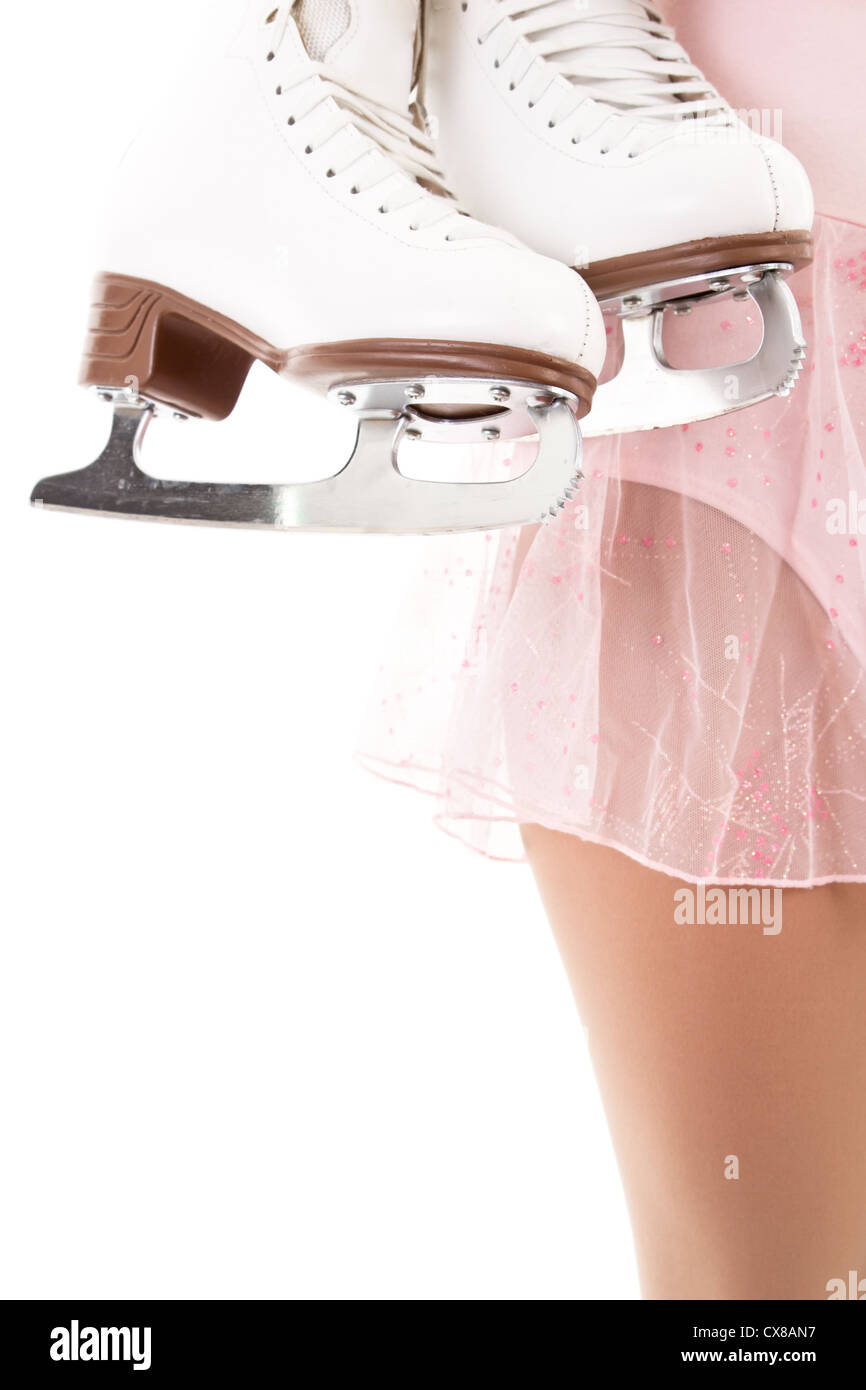 Closeup of figure skating ice skates and outfit Isolated on white ...