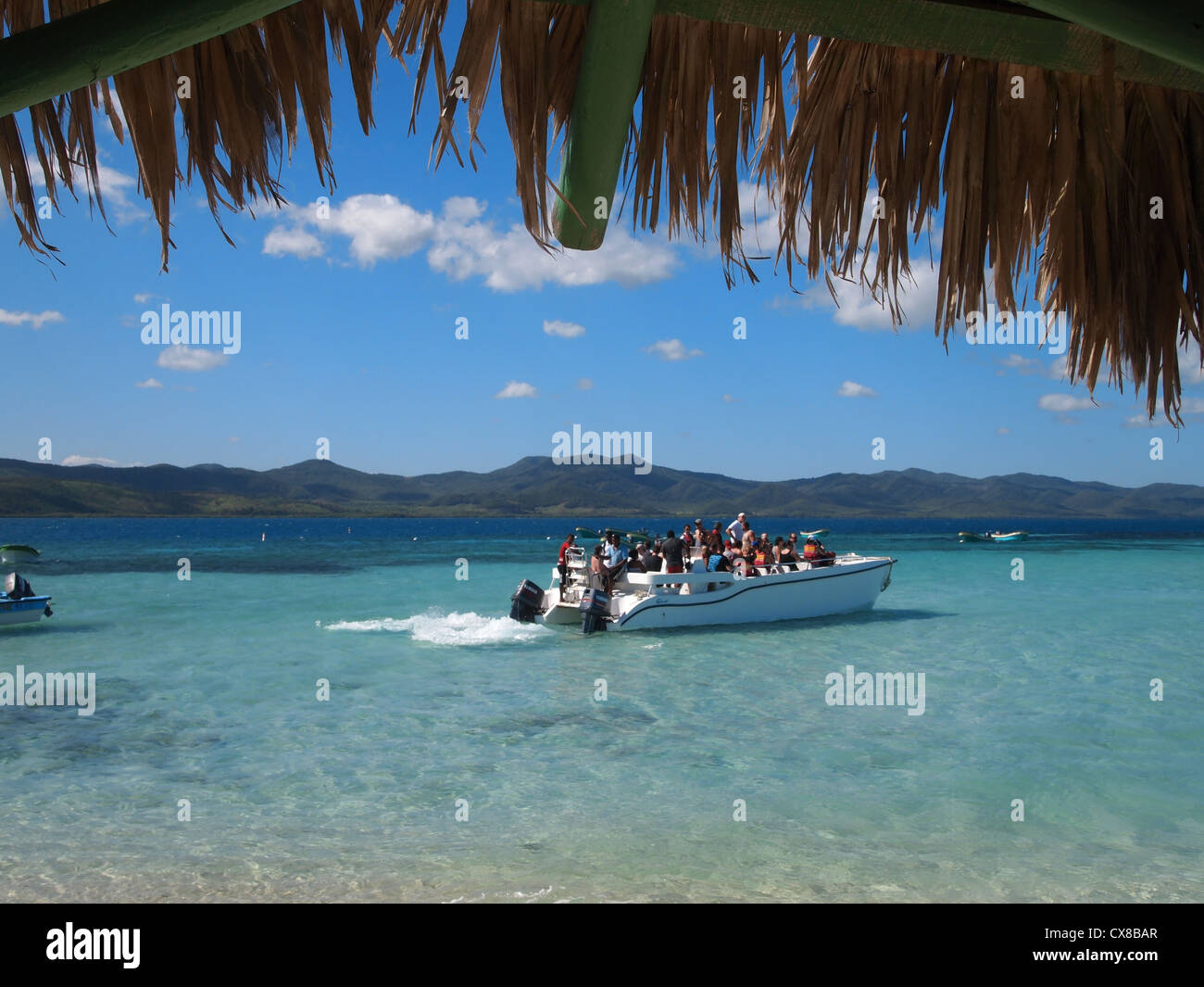A boat in a clean sea Stock Photo - Alamy