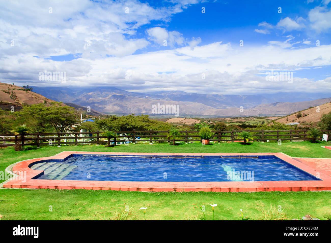 Swimming pool with a view of the andes Stock Photo - Alamy