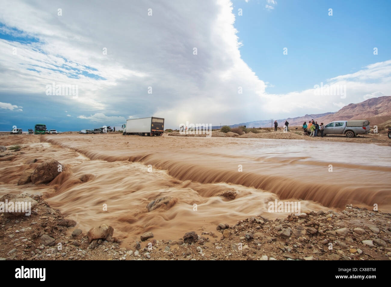 Water Flowing Over A Washed Out Road After A Flood; Jordan Valley ...