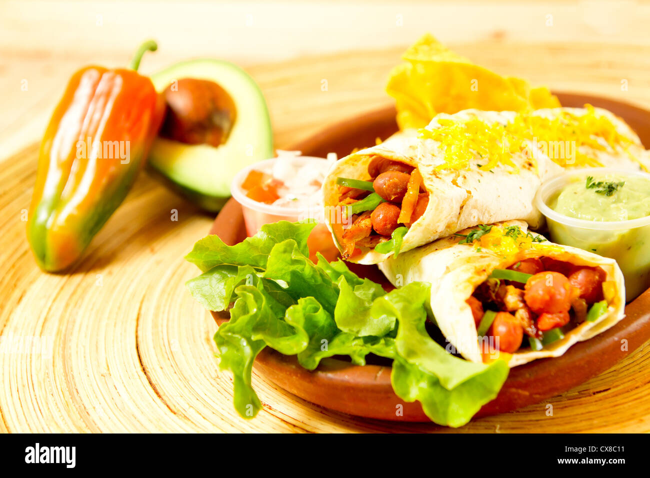 A colorful Mexican food plate with tacos and decoration Stock Photo - Alamy