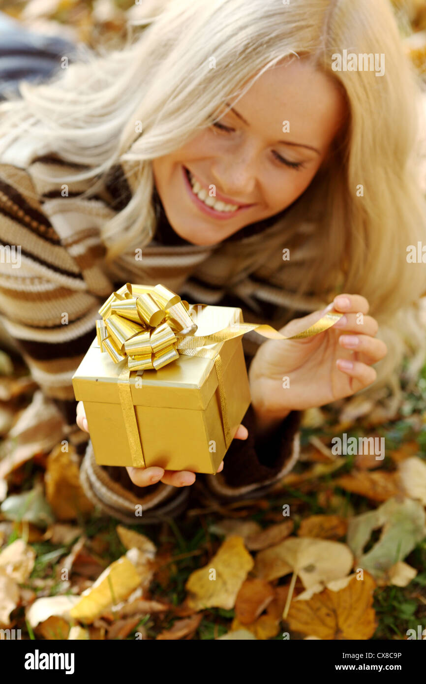 woman take autumn gift in park Stock Photo - Alamy