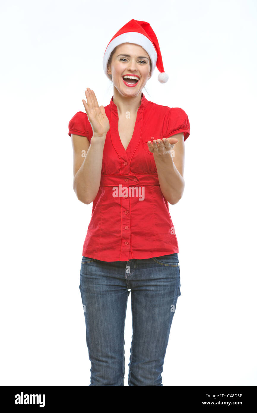Happy young woman in Christmas hat clapping hands Stock Photo - Alamy