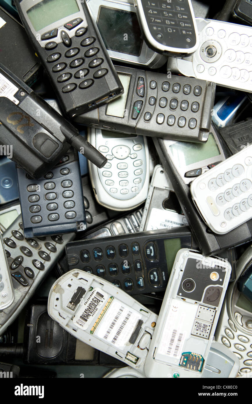 scatered mobile phones ready for recycle e-waste Stock Photo - Alamy