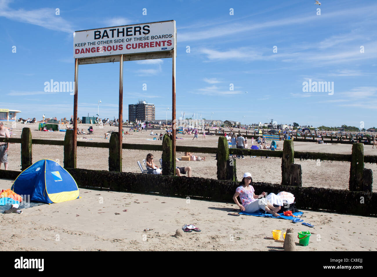 A warning sign for Dangerous Currents on the beach at Littlehampton ...