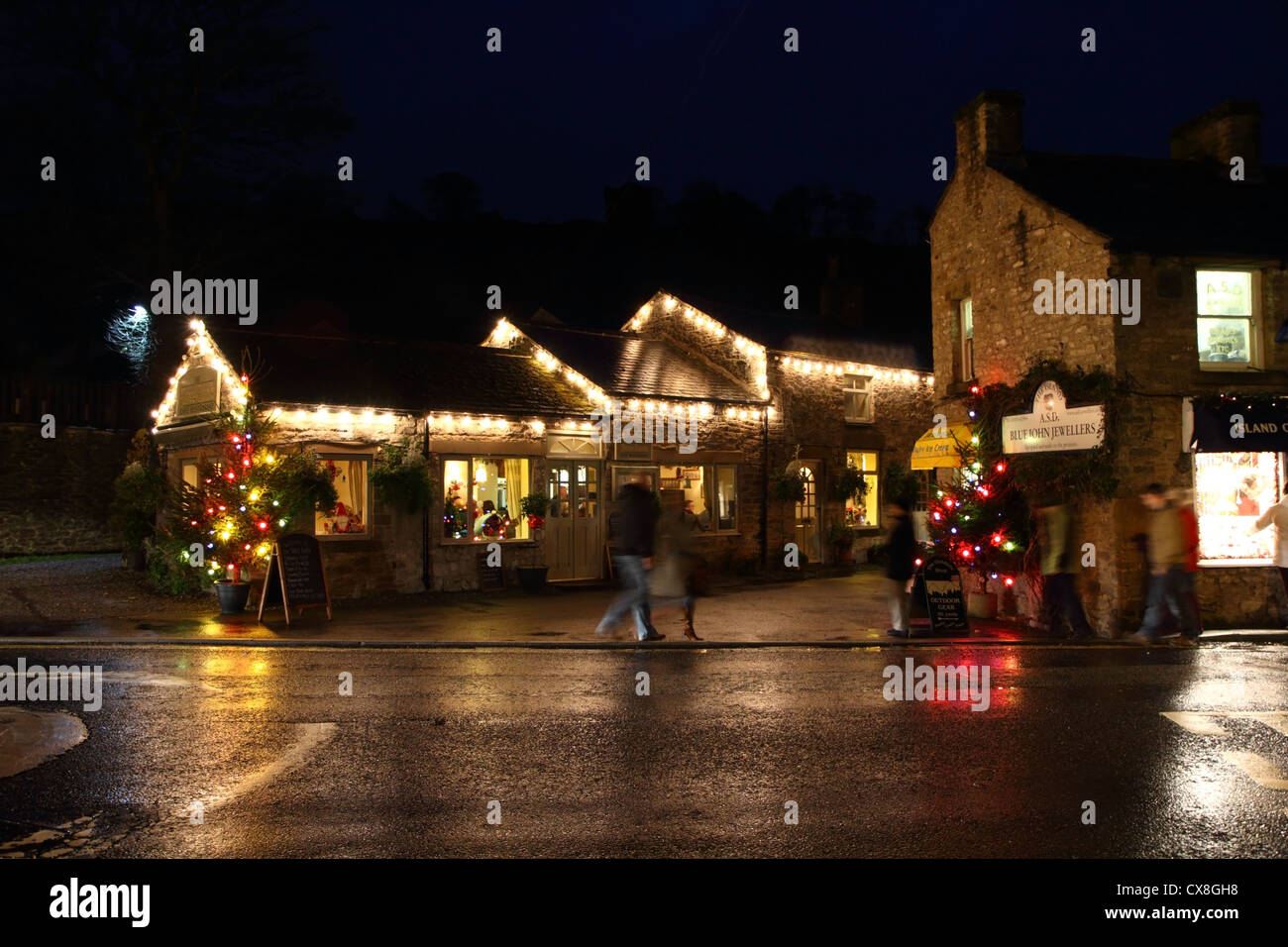 Christmas lights in the high street of the Peak District village of ...