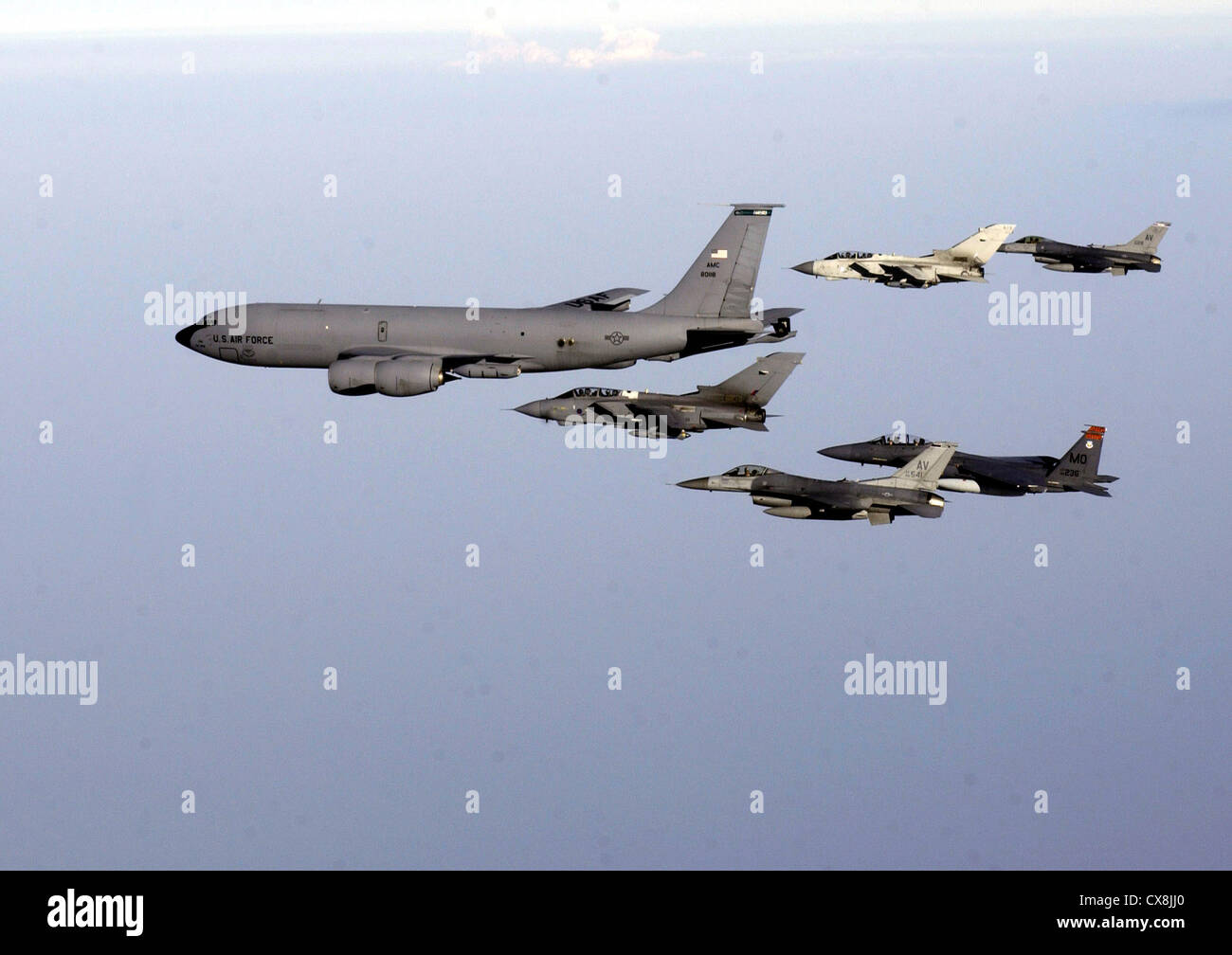 A KC-135 Stratotanker leads a formation of a F-15 Strike Eagle, two F ...
