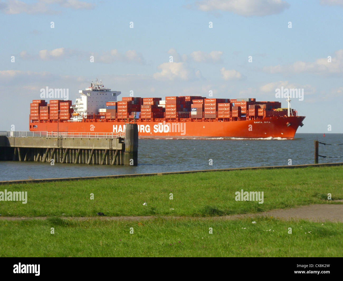 The container ship '''Santa Rosa''' inbound on the river Elbe Stock ...