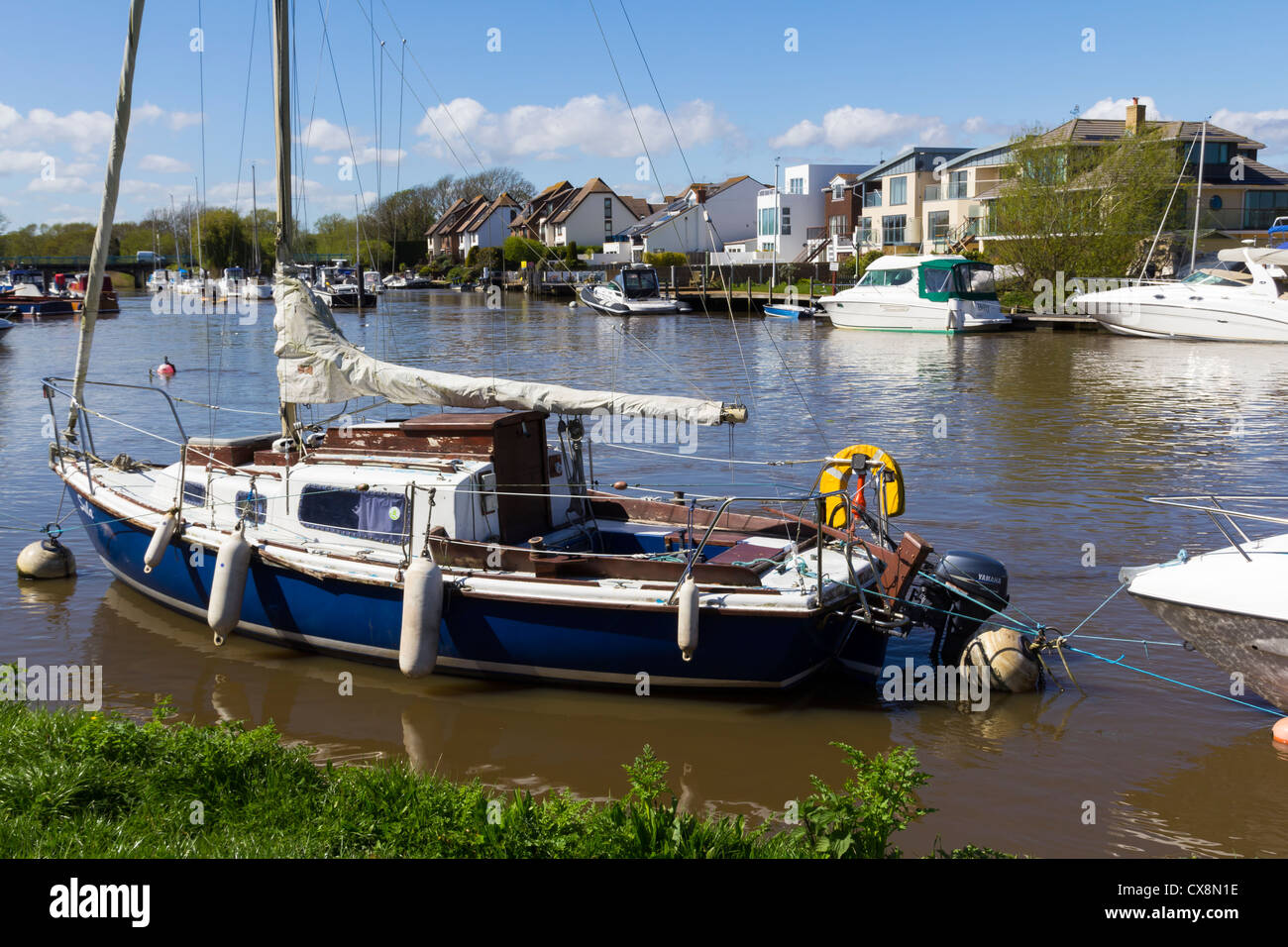 Boats moored on the River Stour at Tuckton Dorset England UK Stock ...