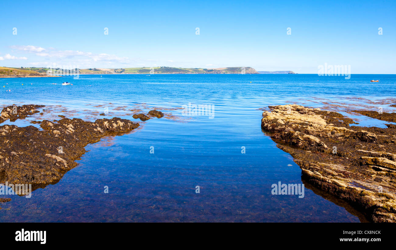 Vibrant sunny coastal inlet on the Cornish coast at Portscatho Stock ...
