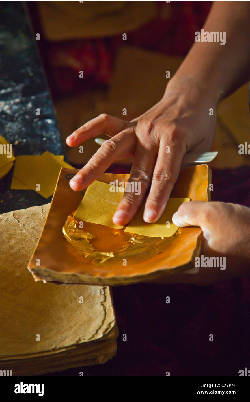 The making of GOLD LEAF is a specialty of MANDALAY - MYANMAR Stock ...