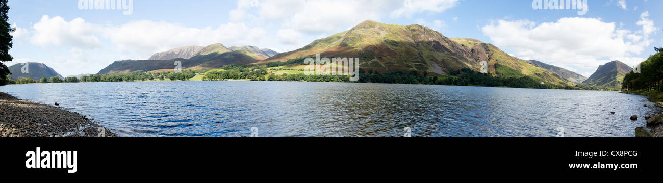 Mountains reflect into Buttermere calm lake in English Lake District ...