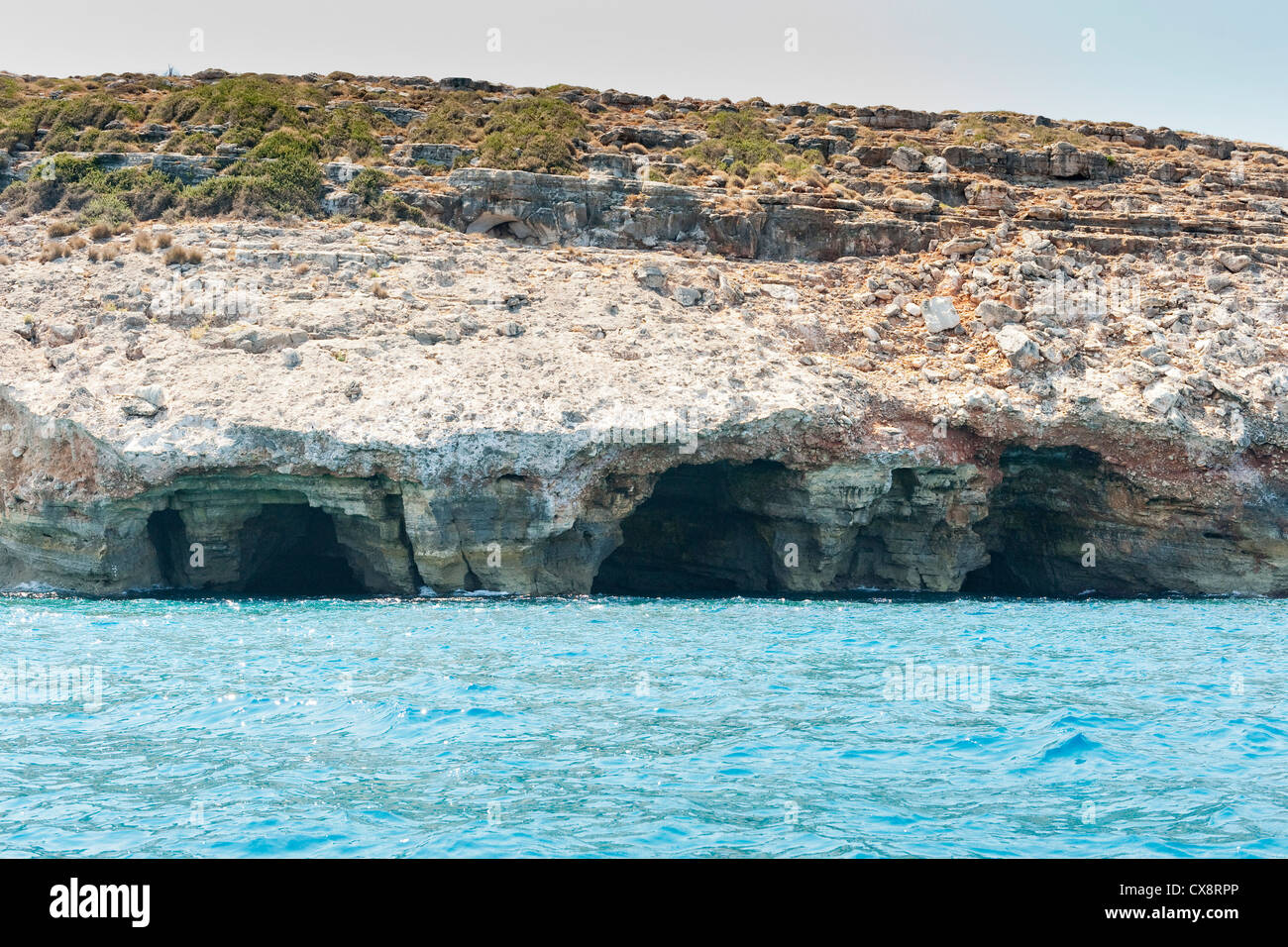 Sea cave entrances Crete Greece Stock Photo - Alamy