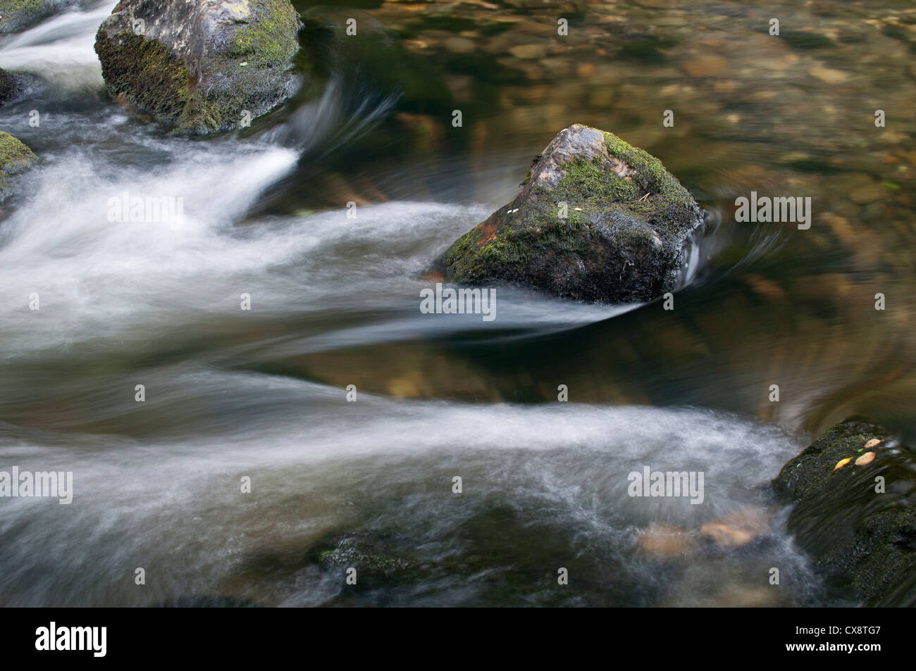 Fast flowing stream, Snowdonia, Wales Stock Photo - Alamy