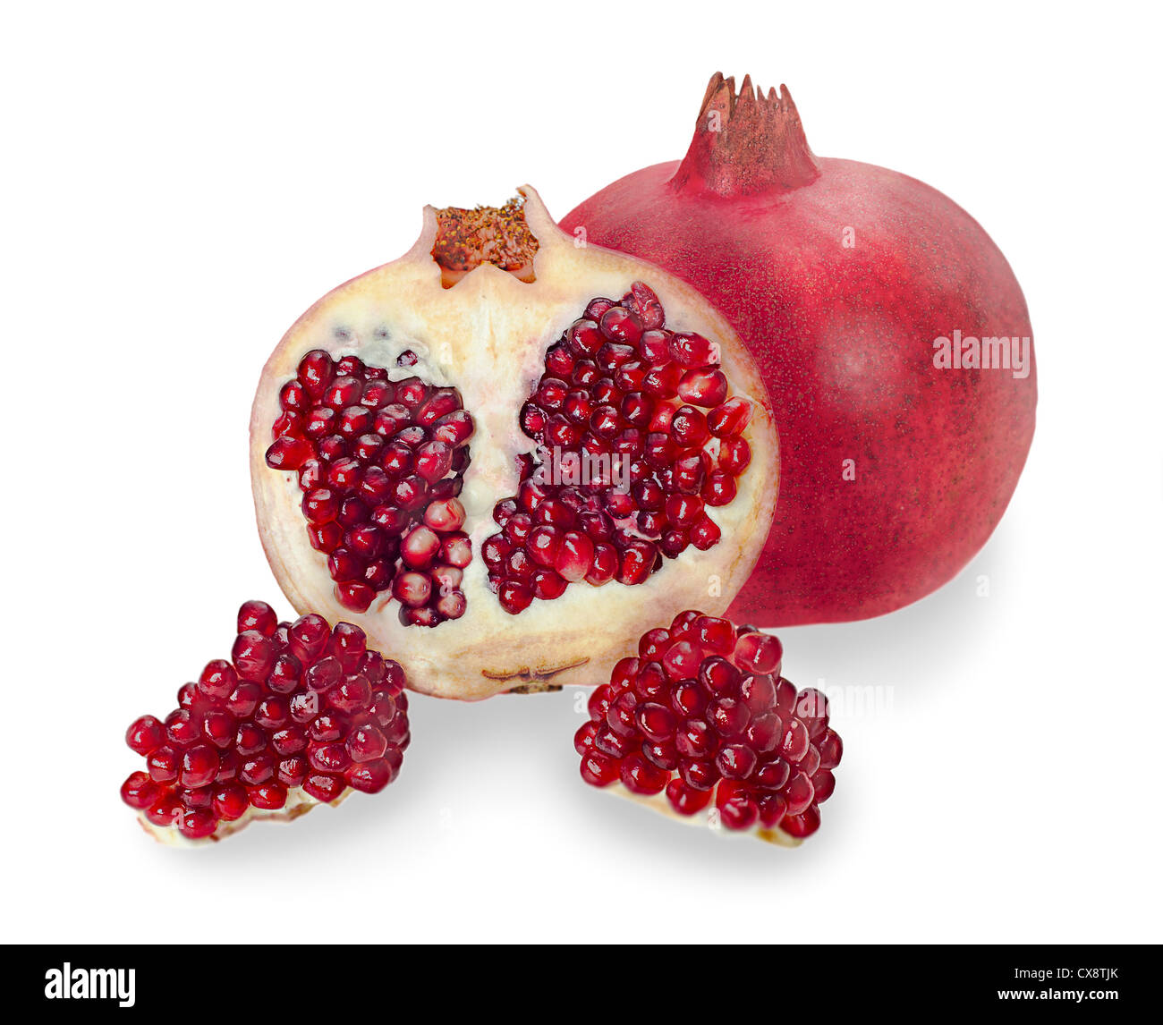 pomegranate fruits closeup isolated on white background Stock Photo - Alamy