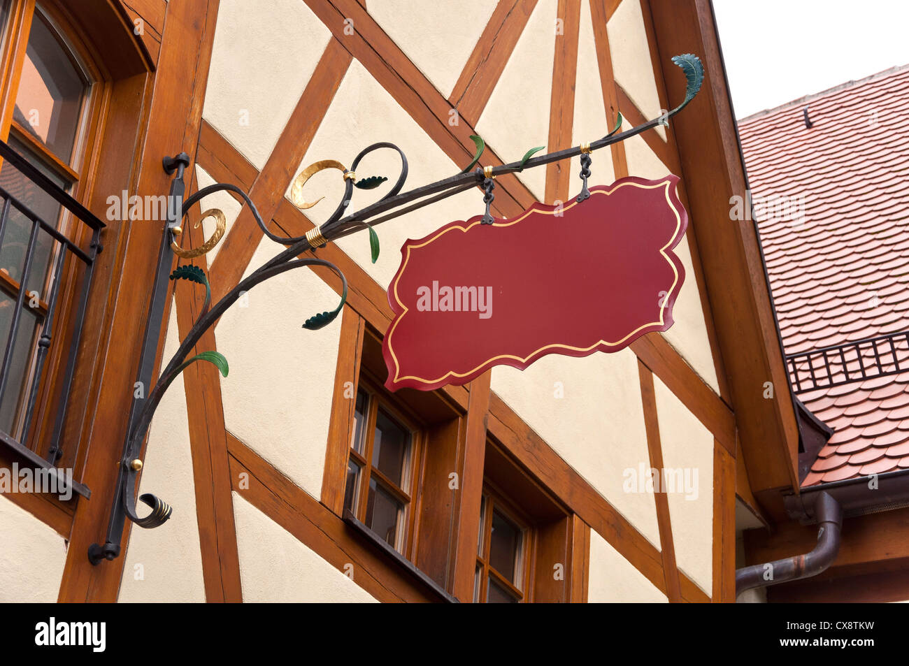 Medieval store sign Stock Photo - Alamy