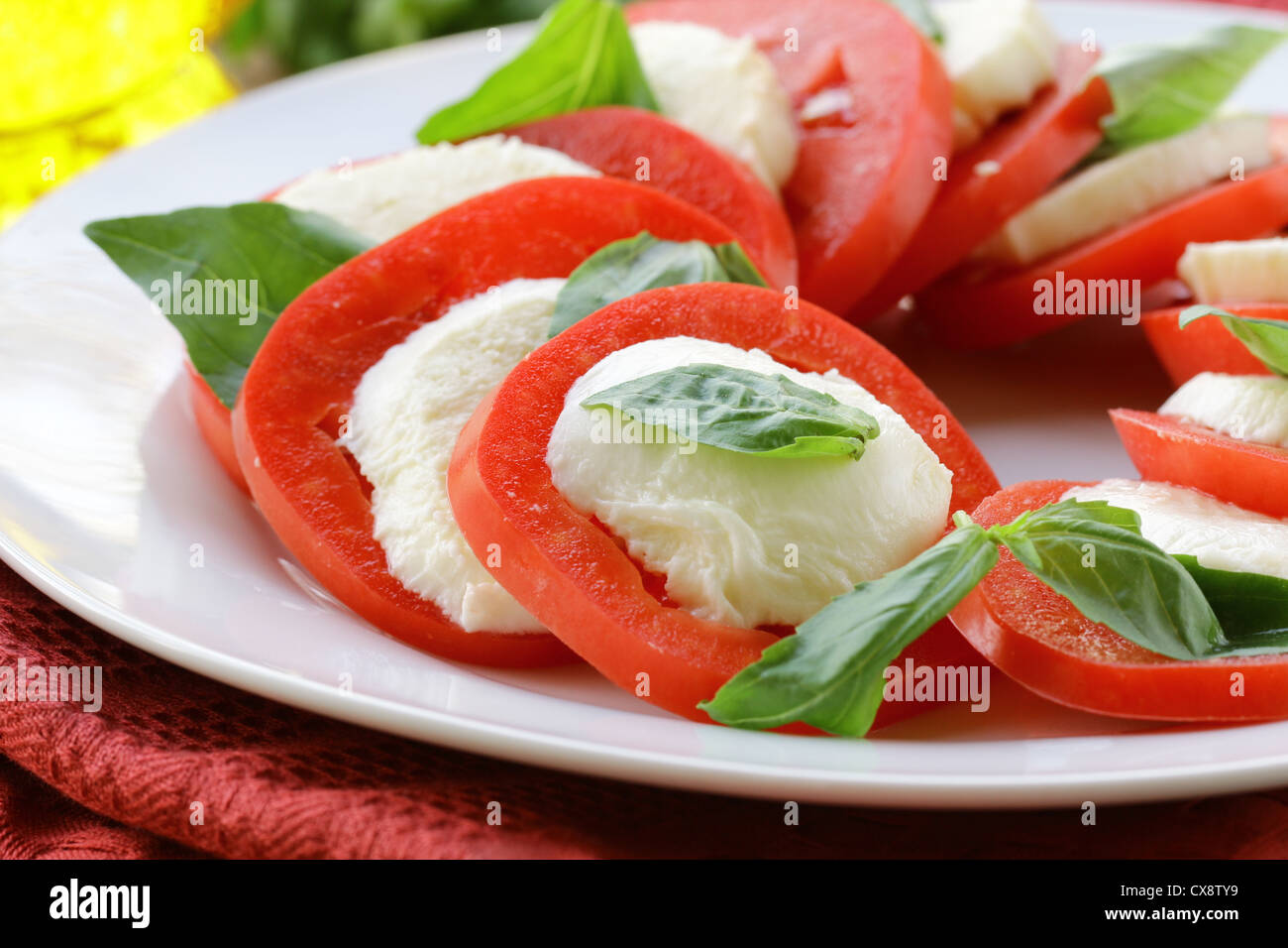 Italian salad with mozzarella cheese and tomato Stock Photo - Alamy