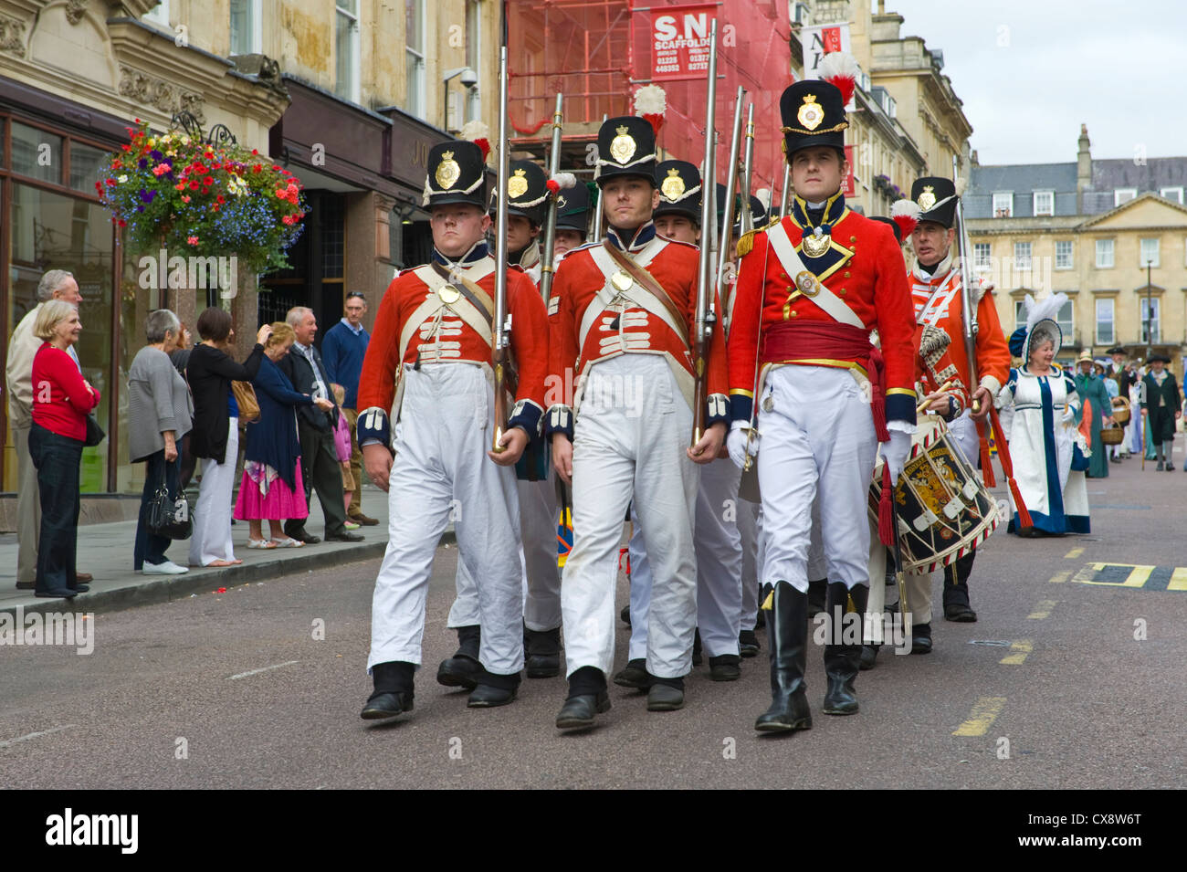 Red Coat soldiers in Regency uniform costume march through Bath city ...