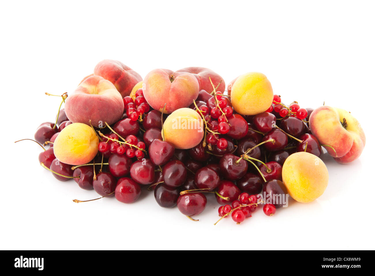 Pile of fresh summer fruit isolated over white background Stock Photo ...