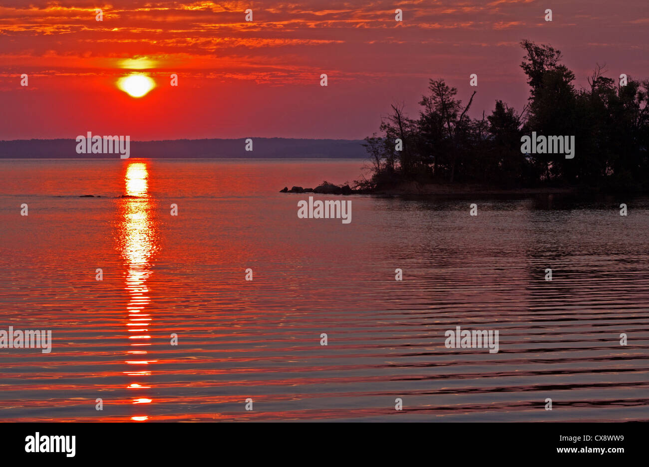 Sunrise on the lake Stock Photo - Alamy
