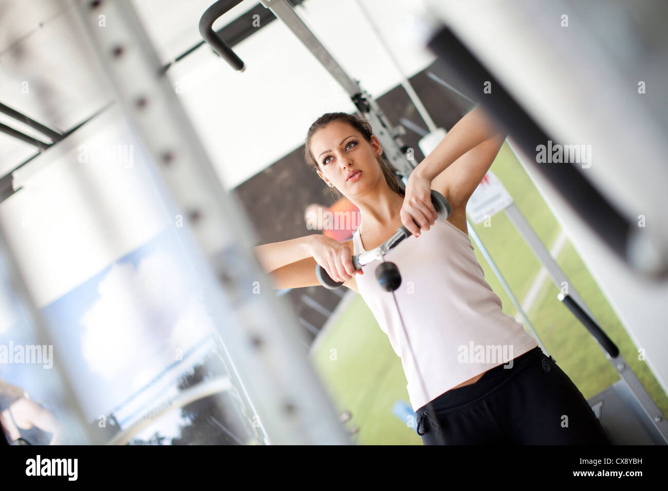 Young girl training in the gym Stock Photo - Alamy