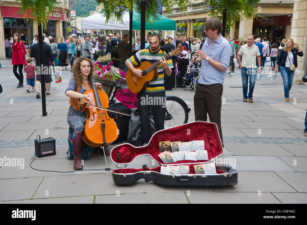 Trio busking on pedestrian area in Bath Somerset England UK Stock Photo ...