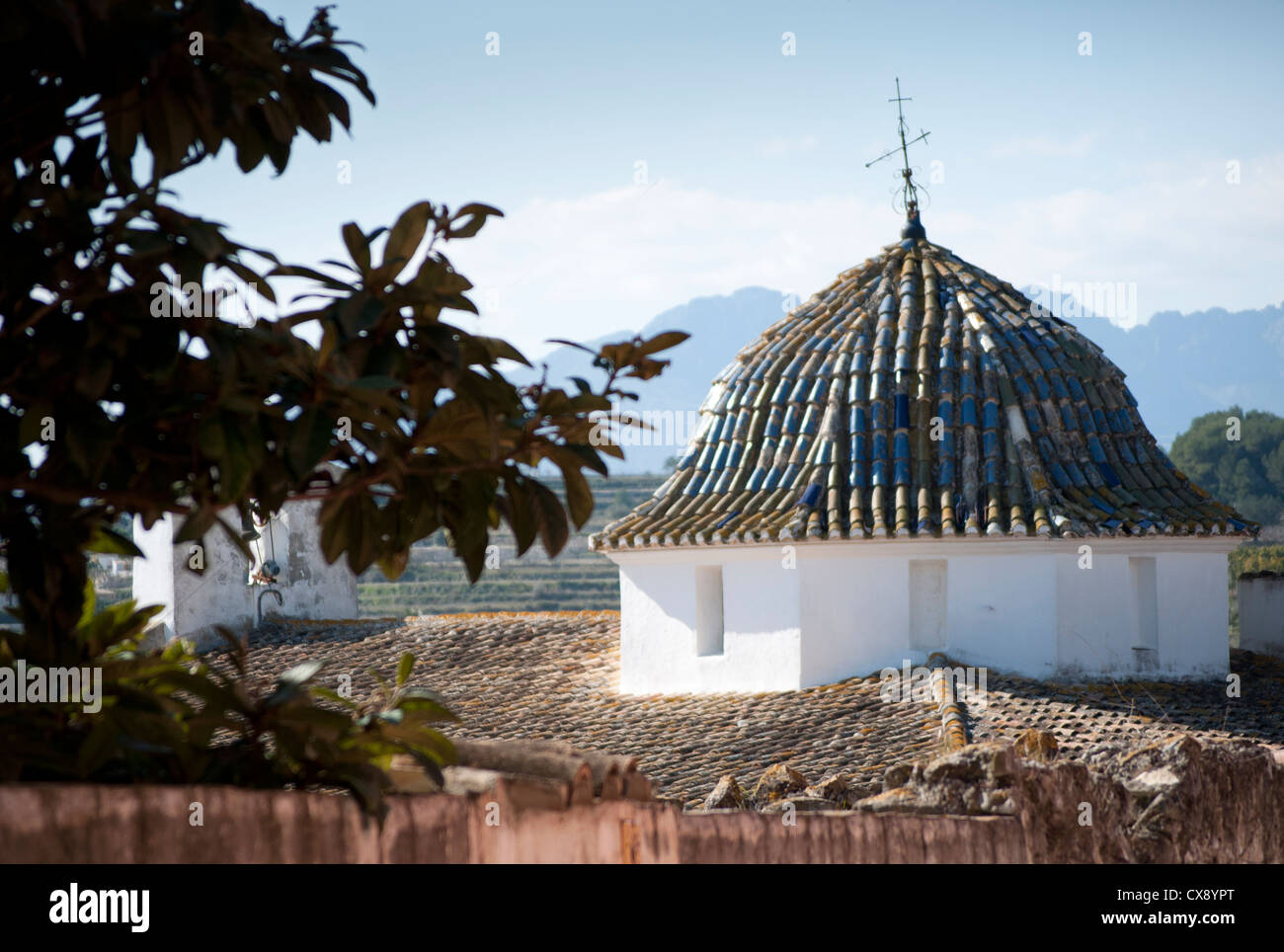An old blue glazed tiled roof of a church in Teulada, near Alicante in ...