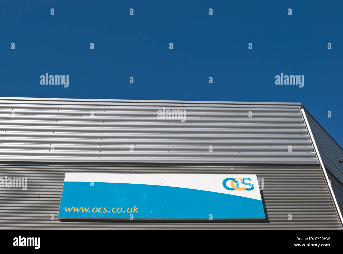 name and logo of ocs, a company providing support services to ...