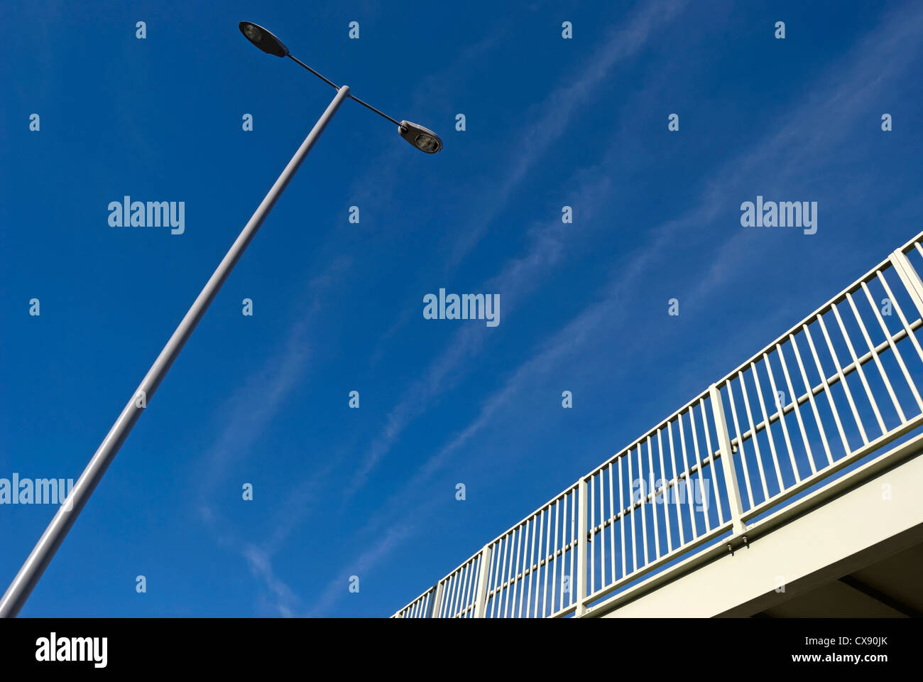 double headed lamppost and section of raised pedestrian footbridge in ...