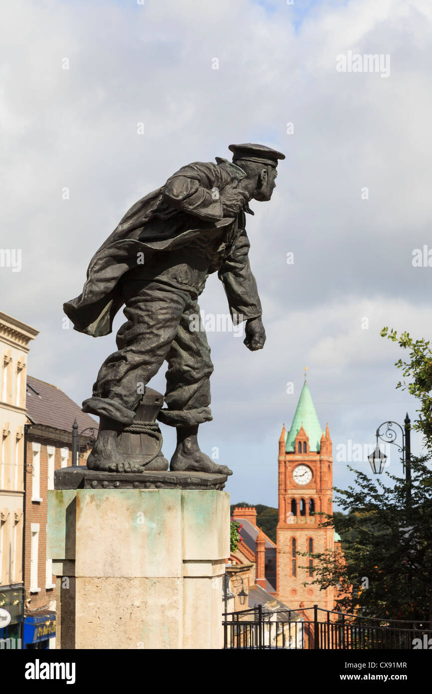 Bronze statue of a sailor on first world war memorial with city hall ...