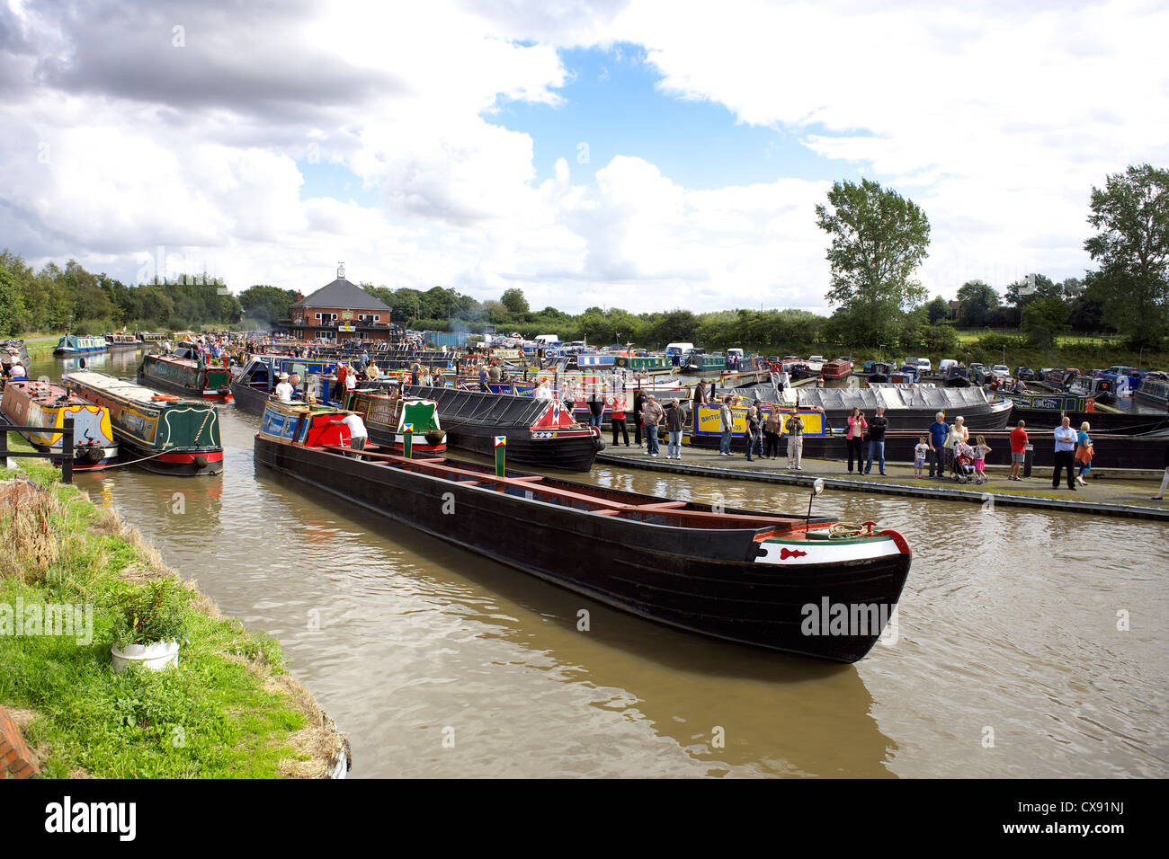Colourful narrowboats at Alvecote Marina, Coventry Canal, near Tamworth ...