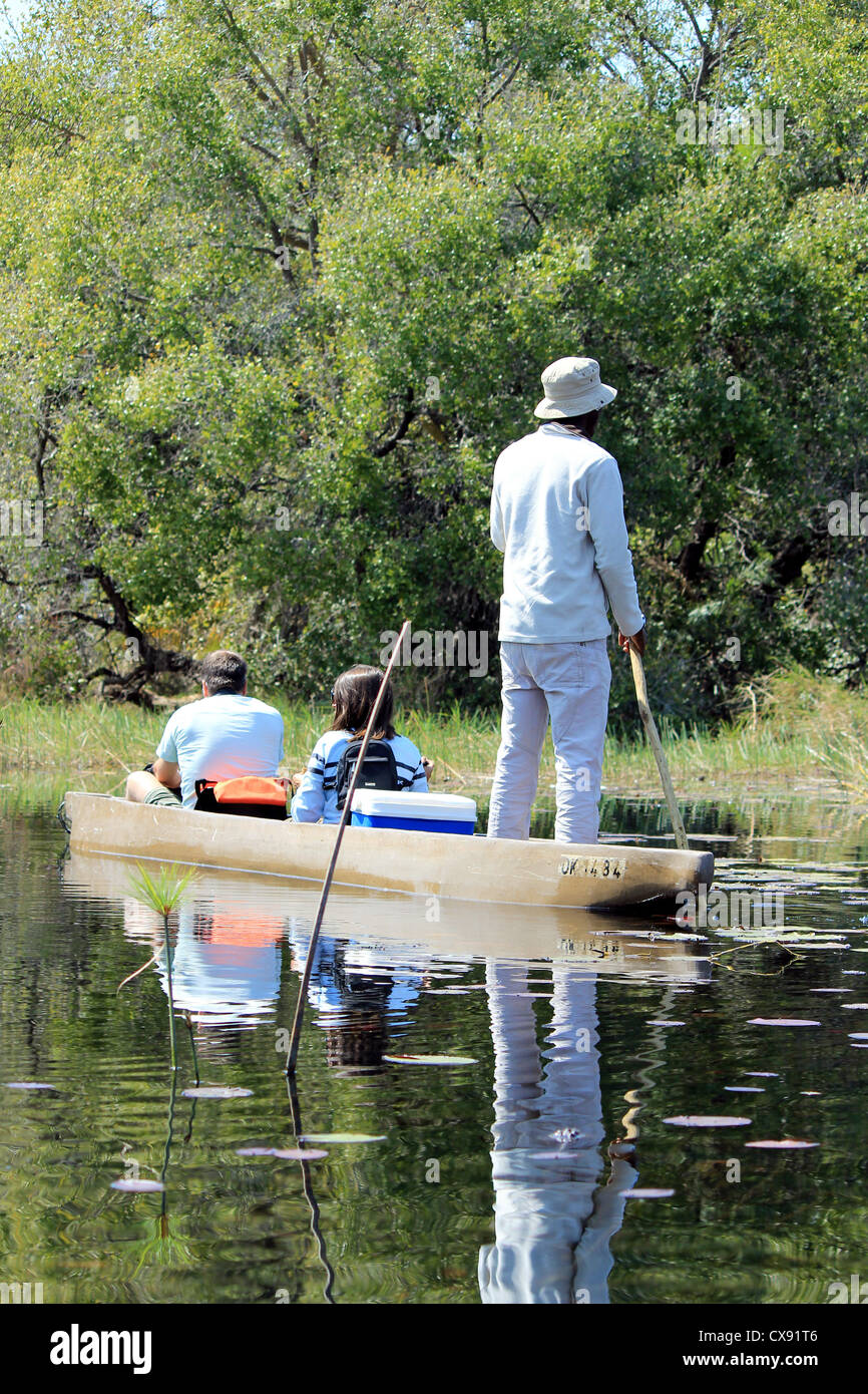 Ride in a traditional Okavango Delta mokoro canoe, through the reed ...